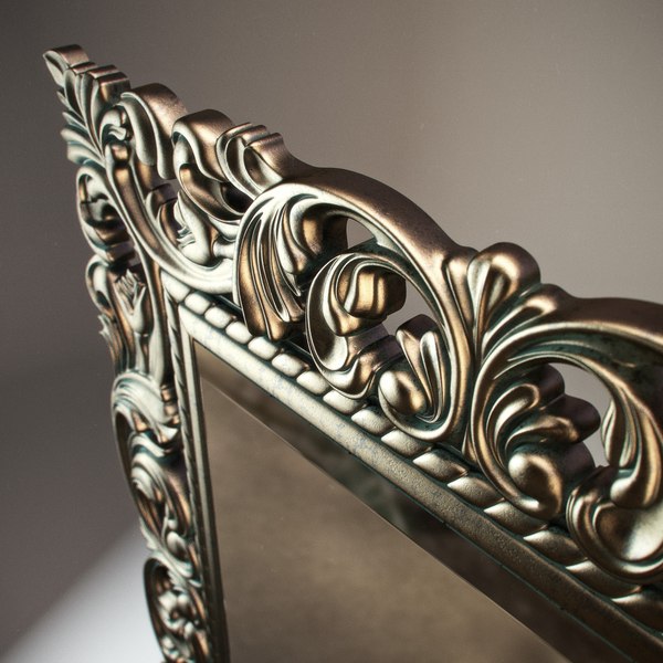 max carved mirror bronze patina